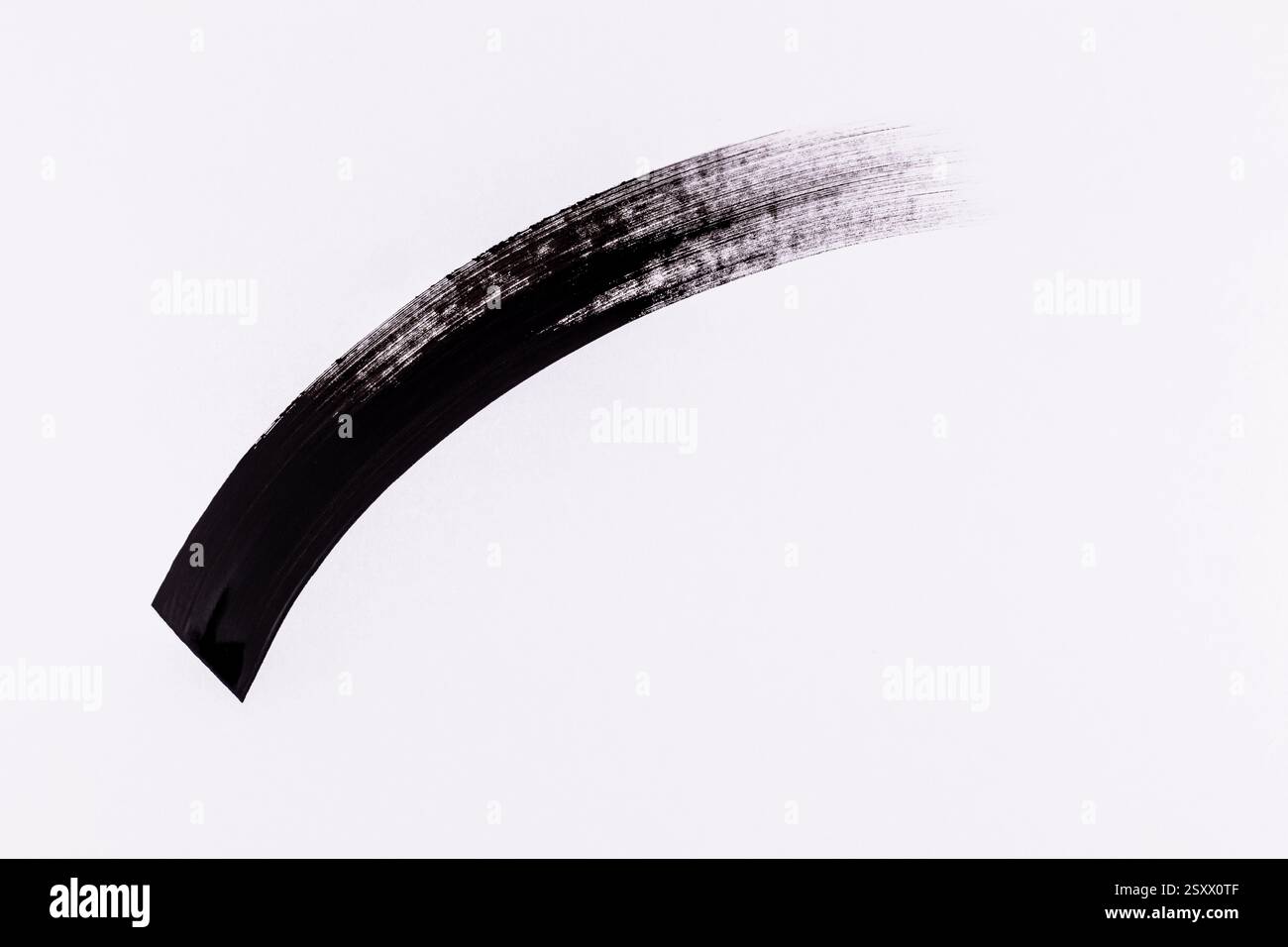 a brush one stroke with black watercolor or acrylic paint. white ...
