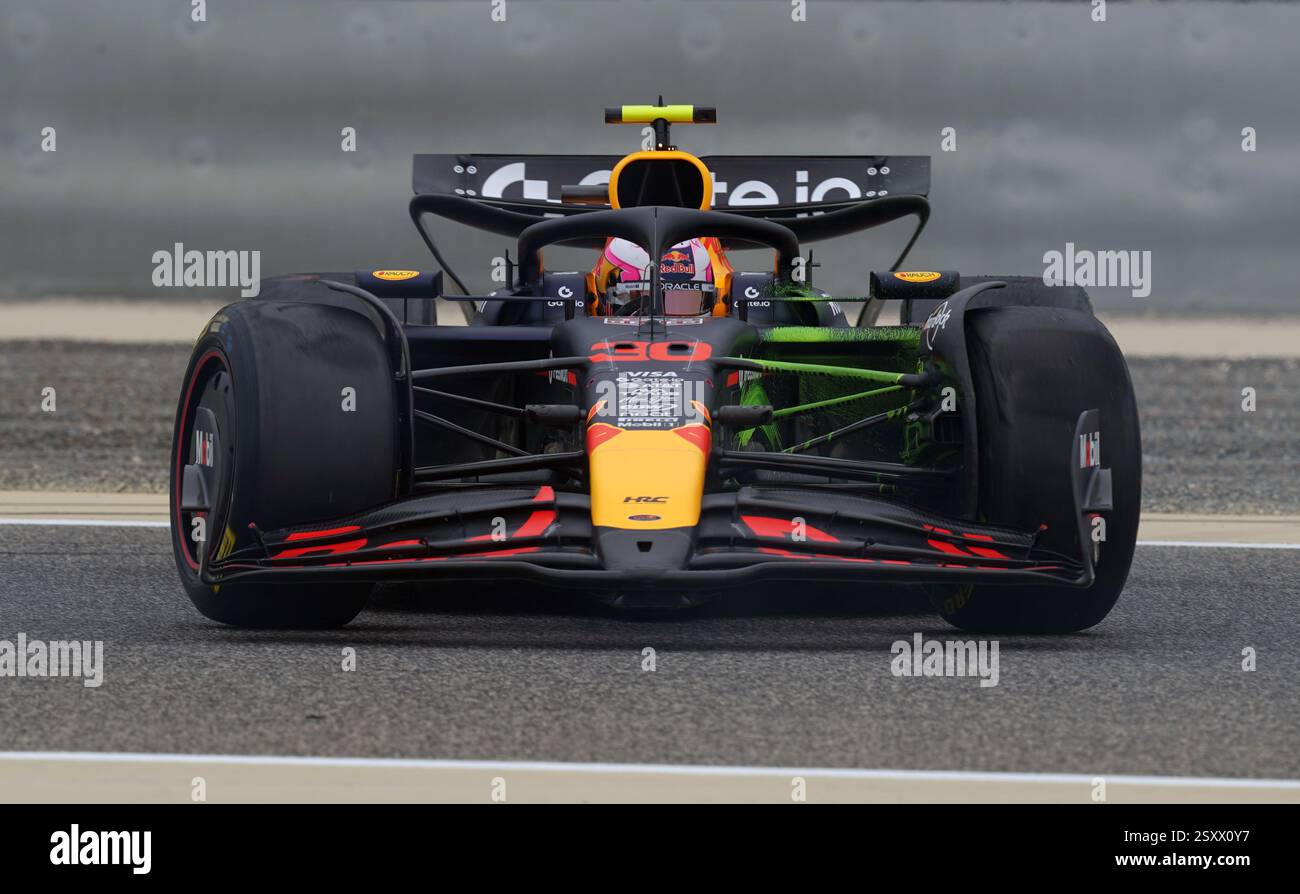 Red Bull driver Liam Lawson spins on approach to turn 3 on day one of ...