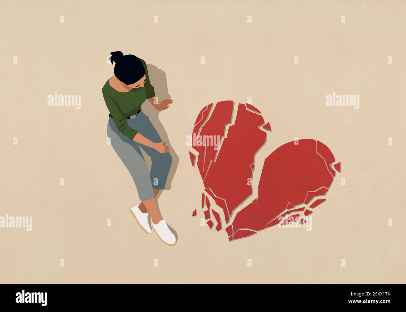 High angle view woman looking down at broken heart Stock Photo - Alamy