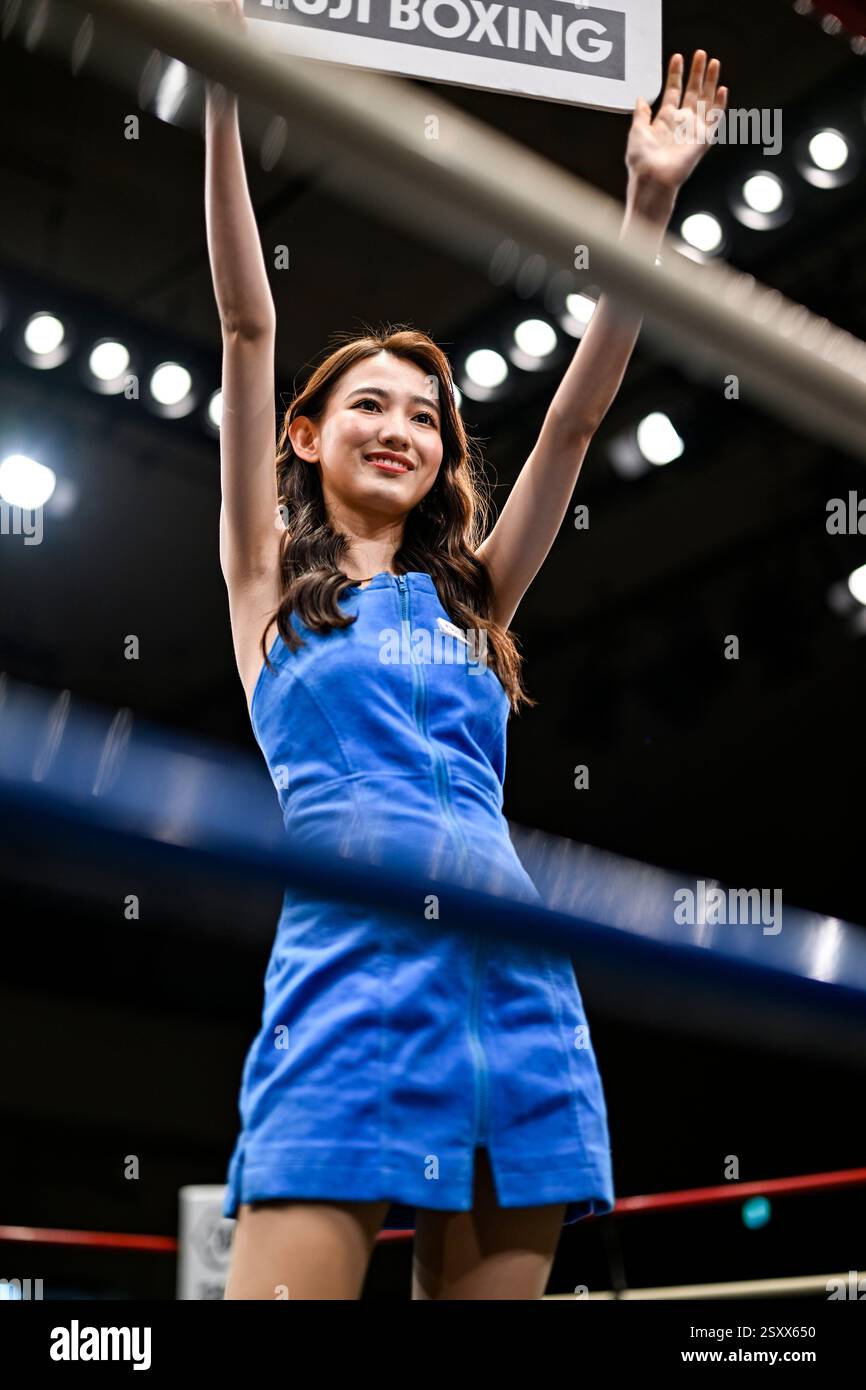 Tokyo, Japan. 11th Feb, 2025. Ring girl Rena Kuroki displays a round sign before the WBO Asia ...