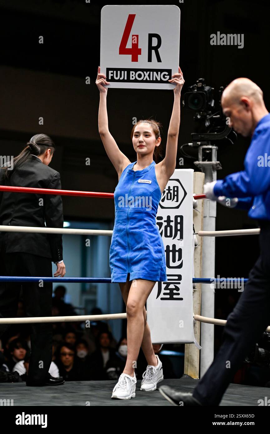 Tokyo, Japan. 11th Feb, 2025. Ring girl Rena Amano displays a fourth ...
