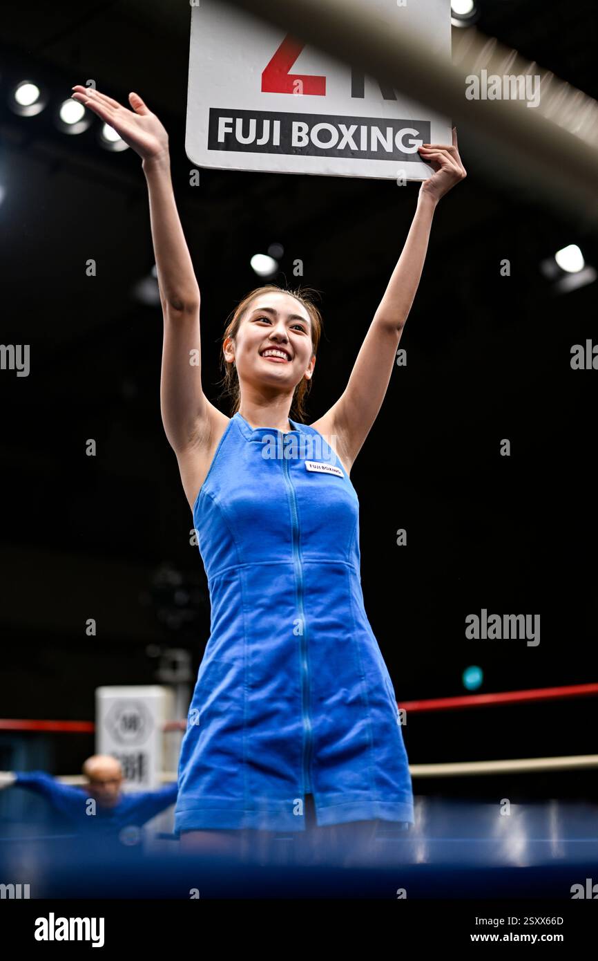 Tokyo, Japan. 11th Feb, 2025. Ring girl Rena Amano displays a second ...