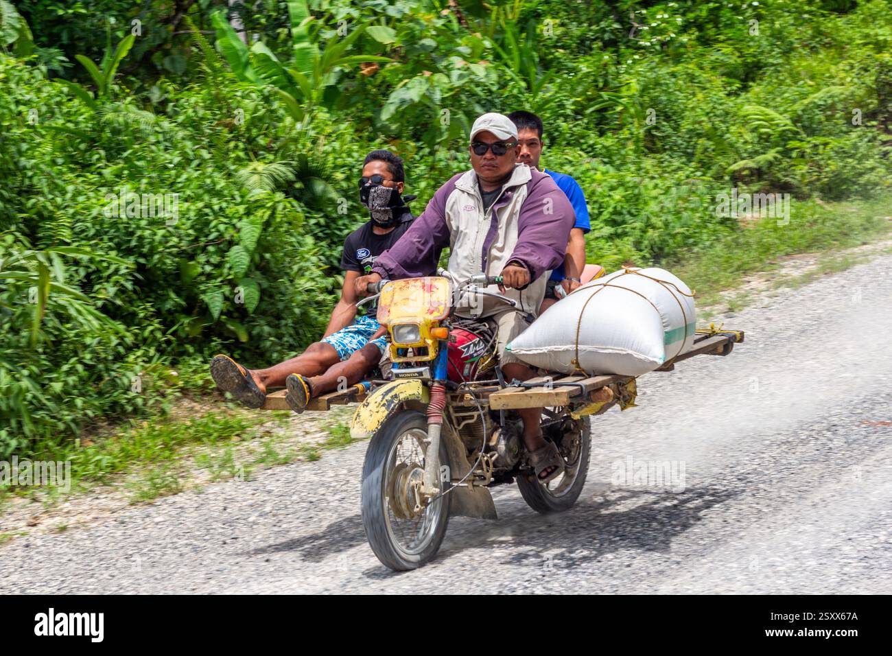 A commuter motorcycle locally called skylab with extended planks on ...