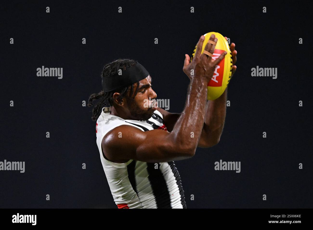 Isaac Quaynor of Collingwood marks the footy during the AFL Community ...