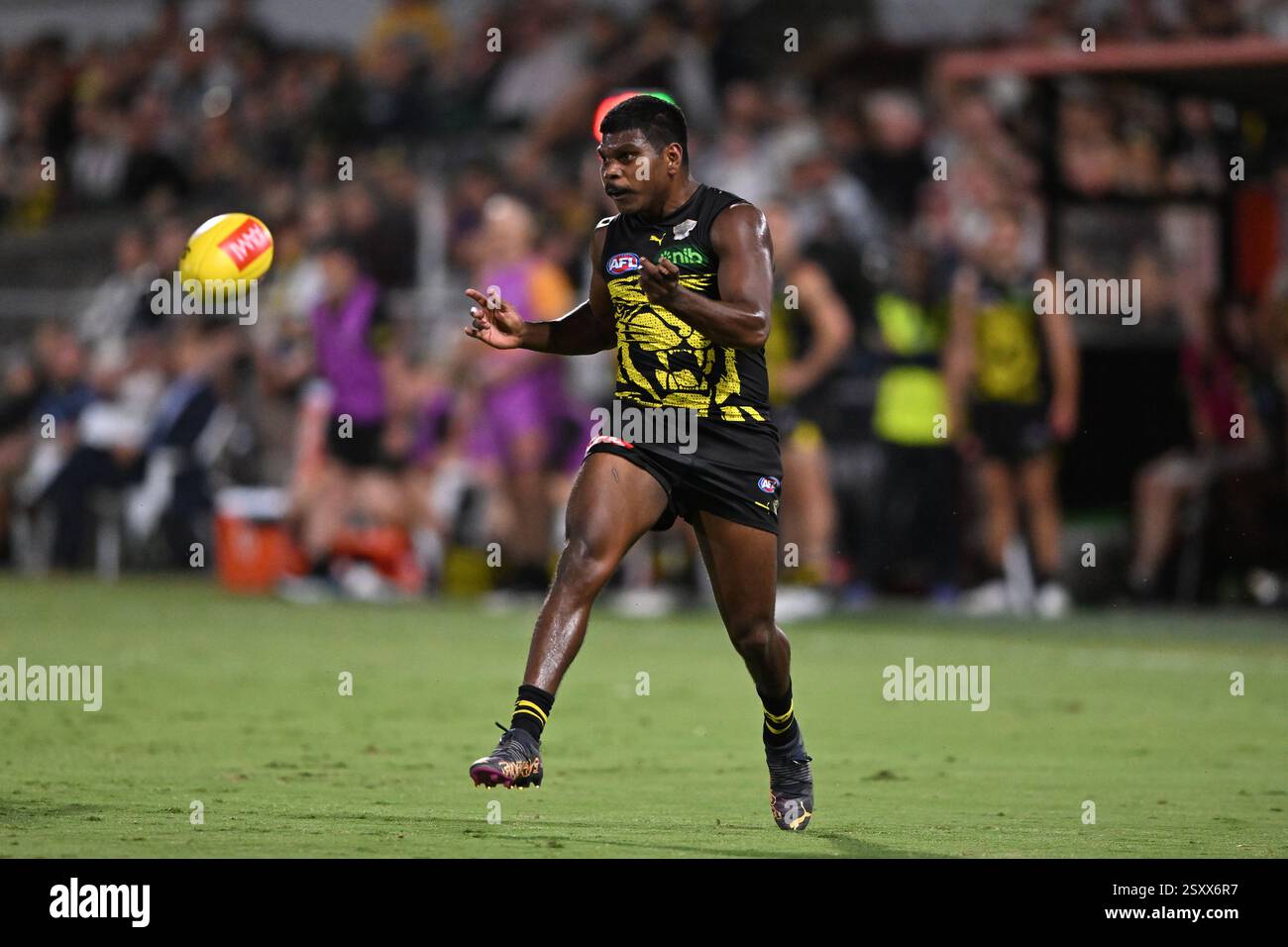 Maurice Rioli of Richmond kicks the footy during the AFL Community ...