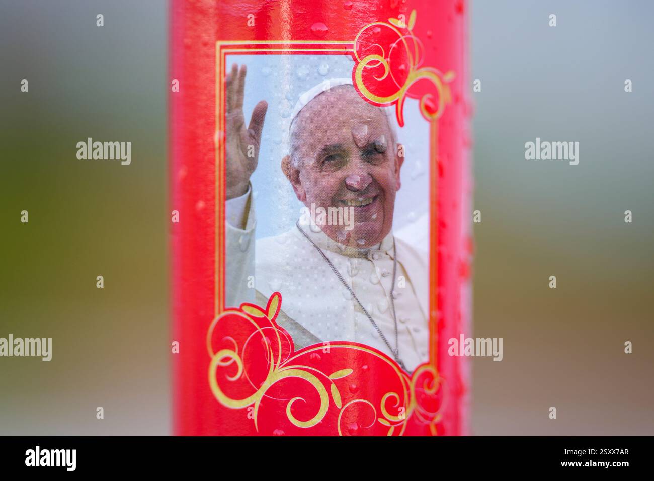 Candles and flowers for Pope Francis are seen at the Agostino Gemelli ...