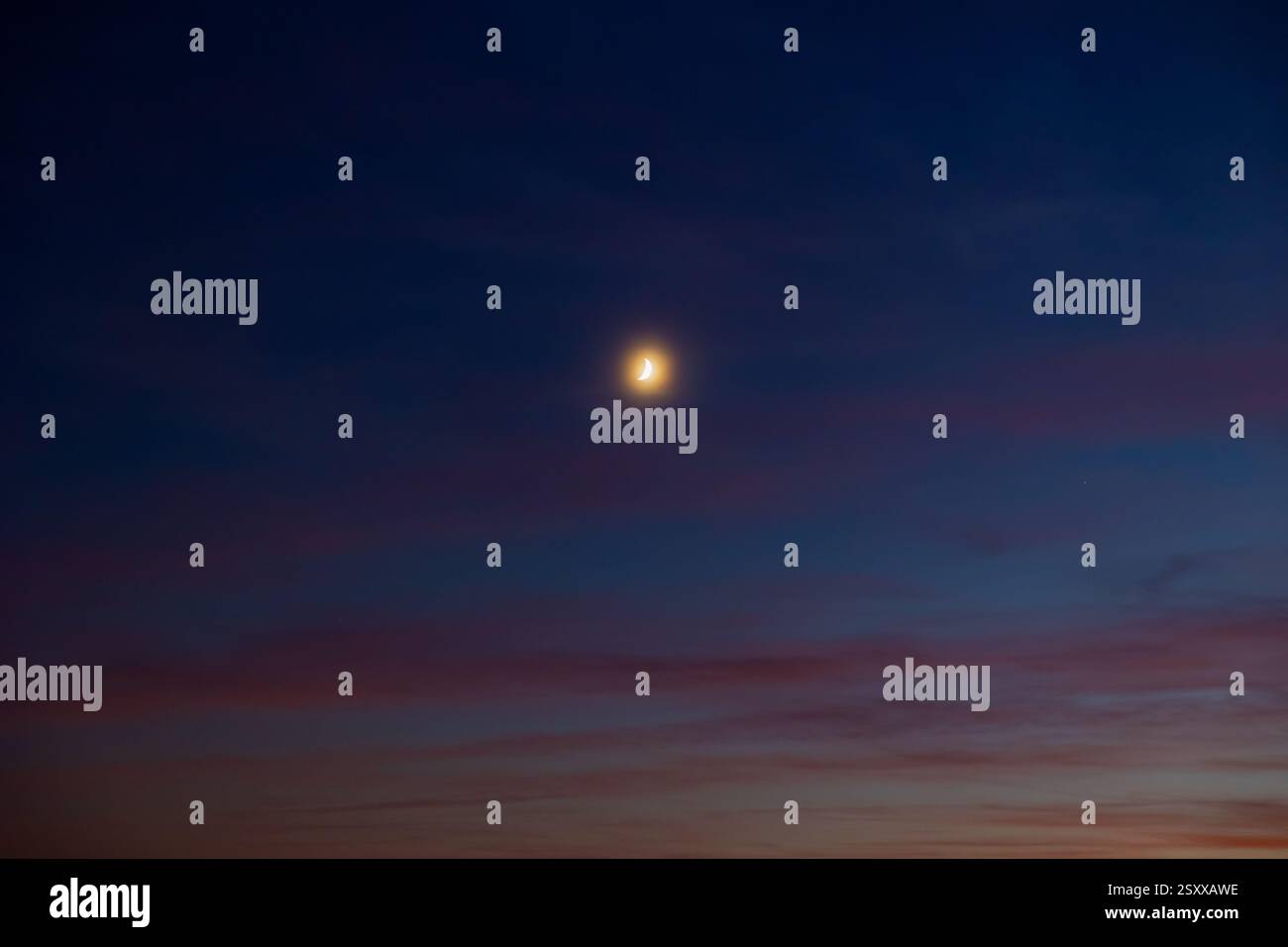 Glowing crescent moon on the hazy sky. Ramadan concept photo. Islamic ...