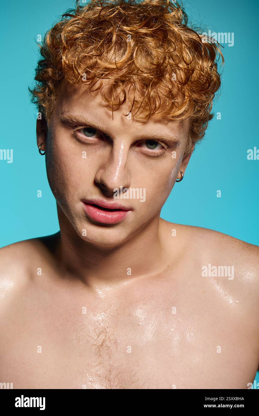 A stylish young man showcases his trendy look with a confident ...