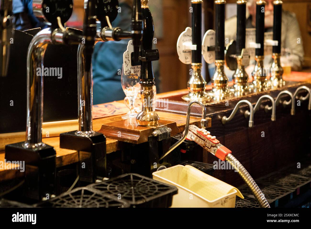 Behind the bar in traditional pub Stock Photo - Alamy