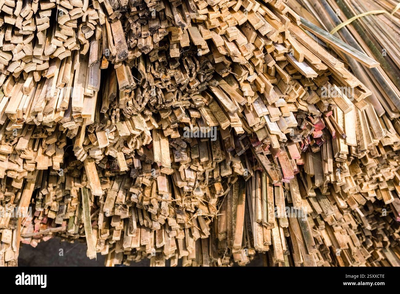 Split bamboo, bundled for the later production of incense sticks. Quang ...