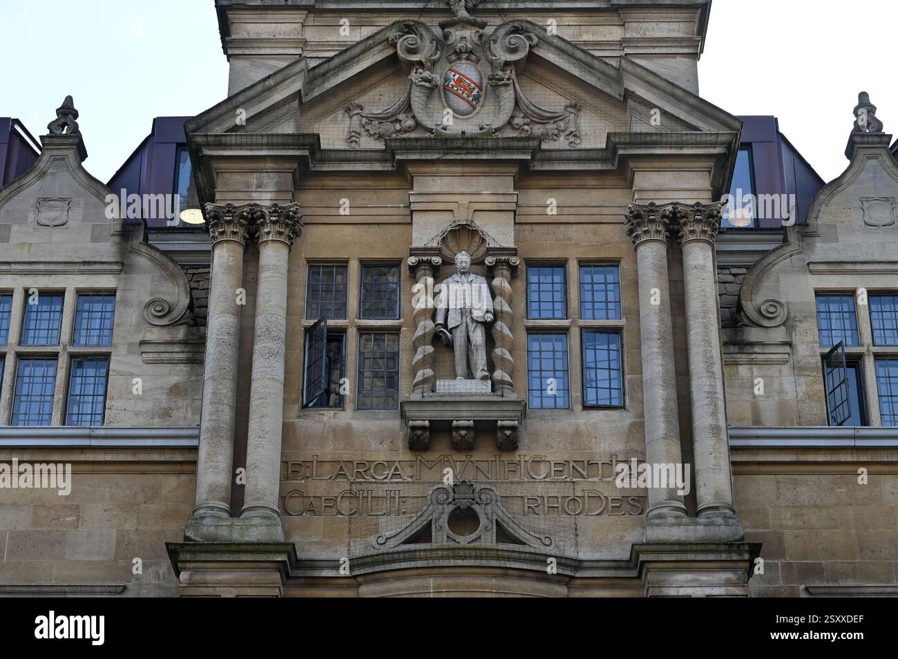 A statue in honour of Cecil Rhodes above the entrance to Oriel College, High Street, Oxford ...