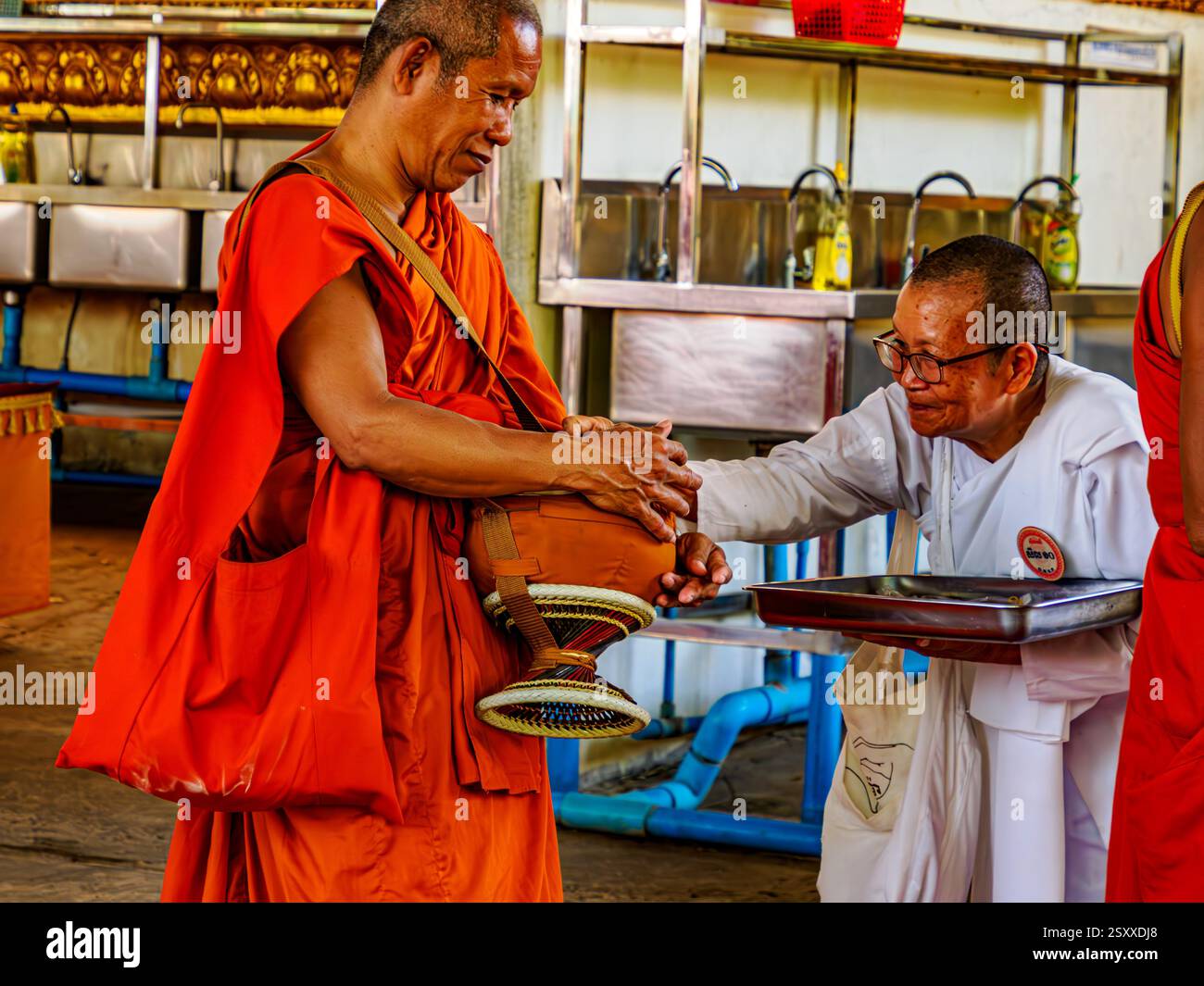 Buddhist monk and nun at Udon Monastery, Cambodia Stock Photo - Alamy