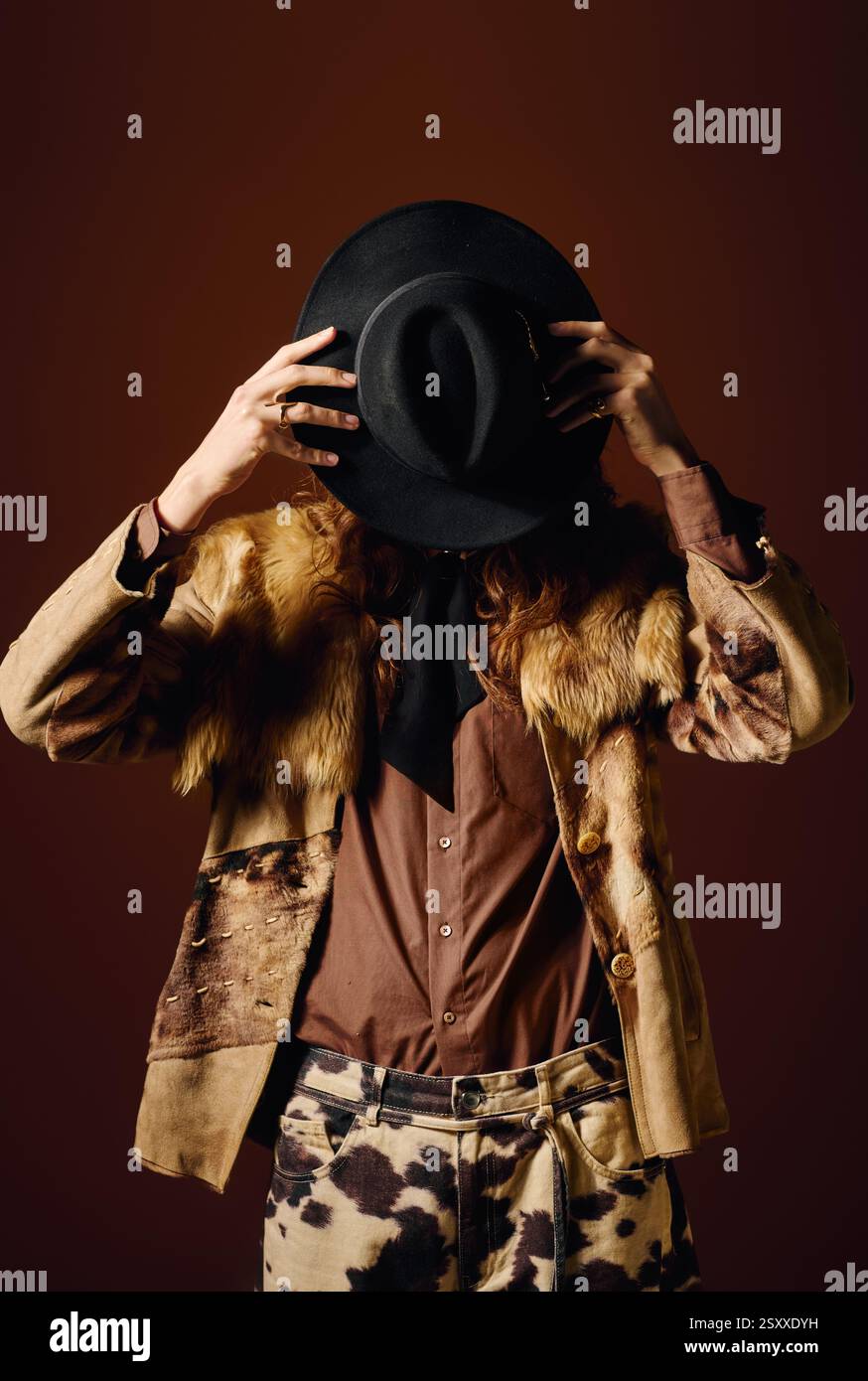 Handsome man puts on hat hi-res stock photography and images - Alamy
