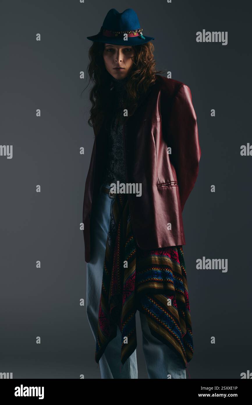 Handsome man exudes charm in a unique outfit featuring a tailored ...