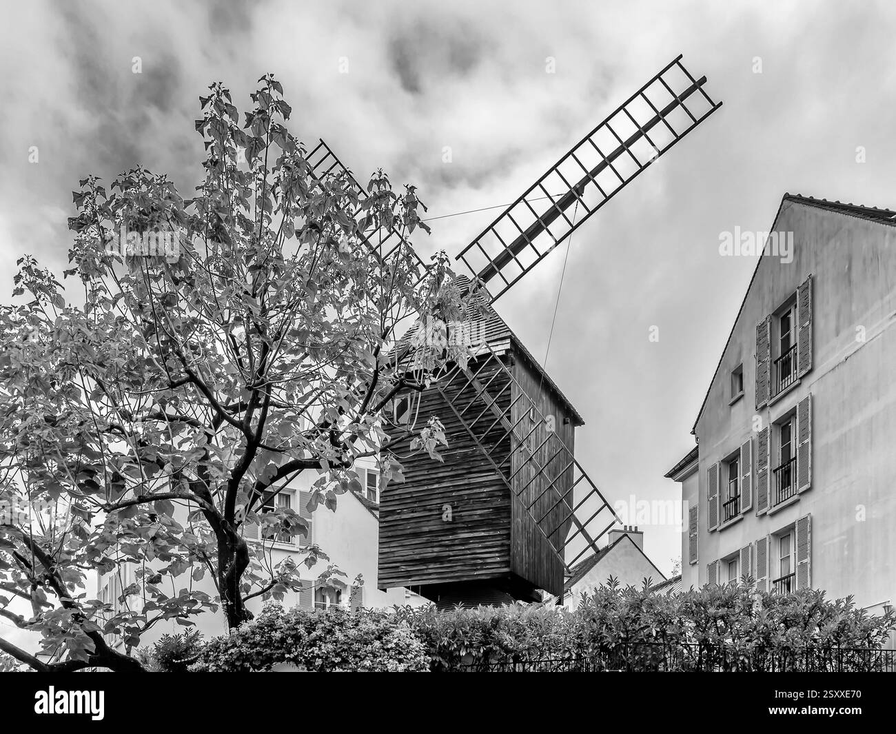 Black and white view of the ancient mill Moulin de la Galette in Paris ...