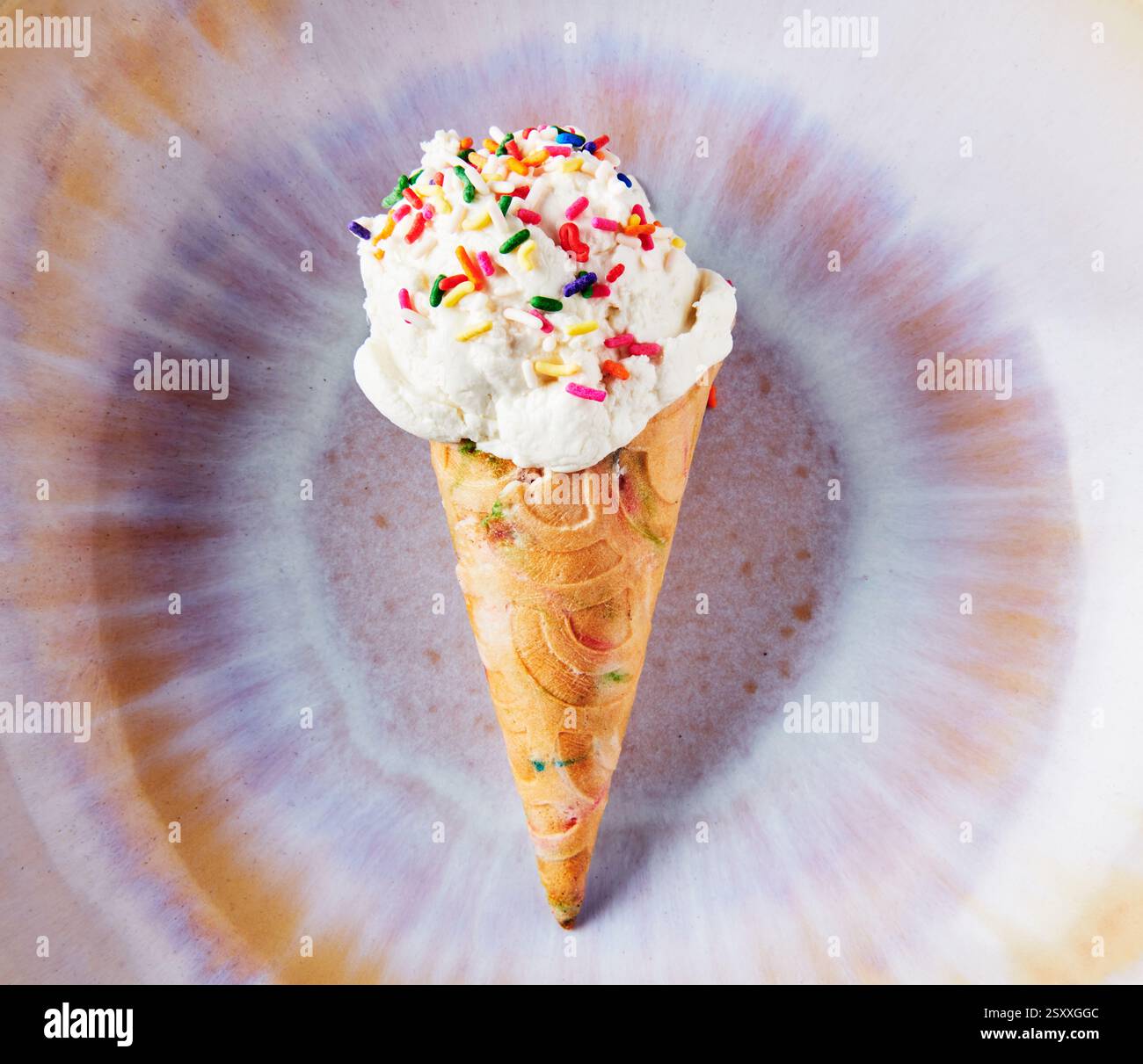Vanilla ice cream cone with sprinkles Stock Photo - Alamy