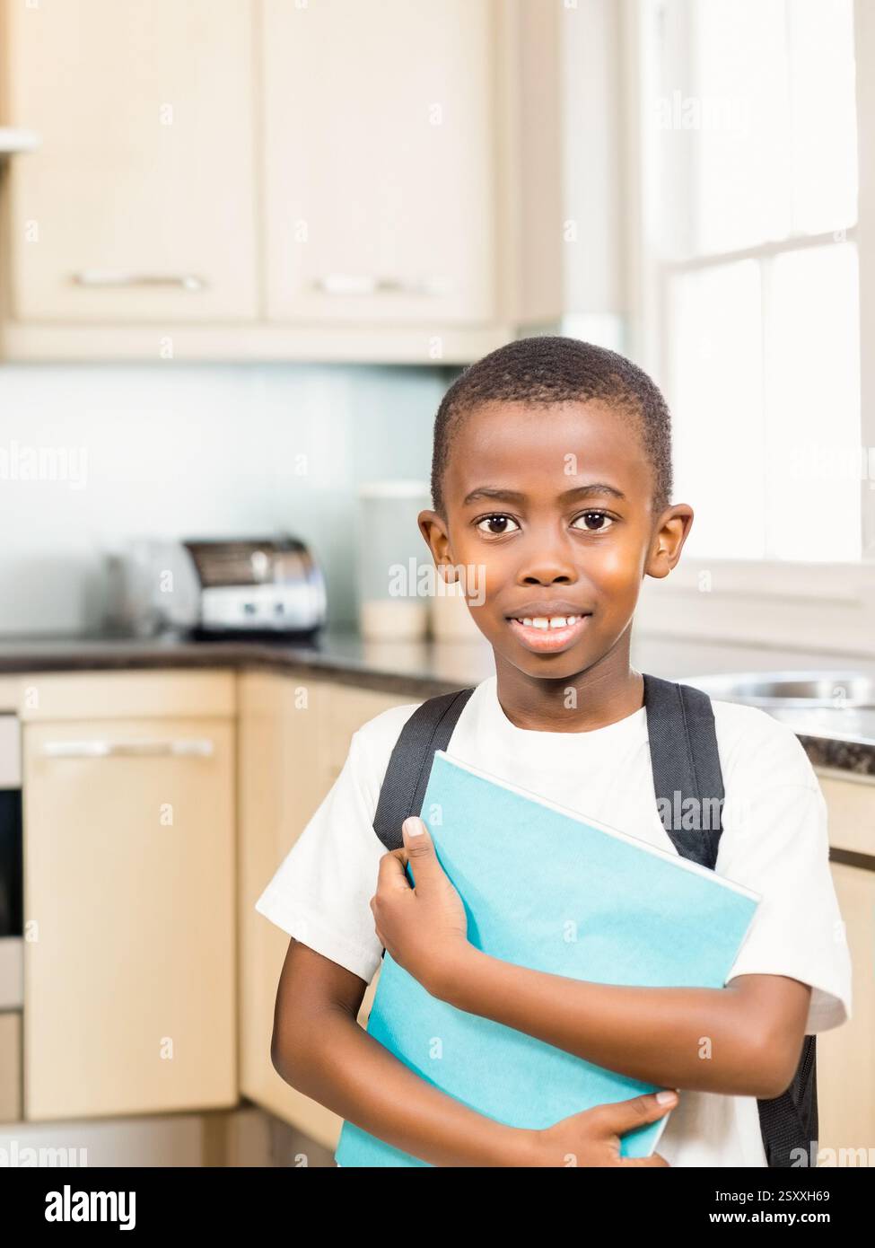 Child ready school in kitchen hi-res stock photography and images - Alamy