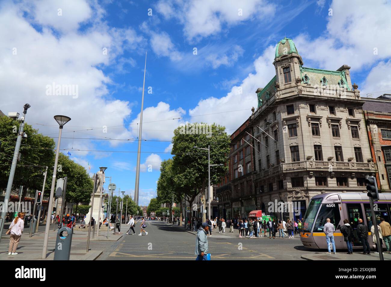 DUBLIN, IRELAND - JULY 6, 2024: People visit O'Connell Street, major ...