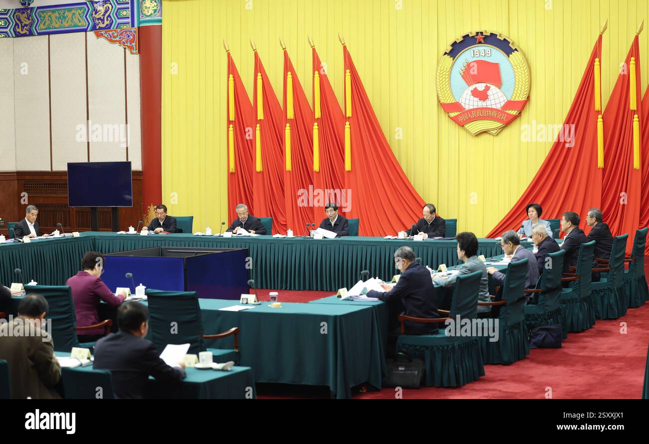 (250226) -- BEIJING, Feb. 26, 2025 (Xinhua) -- Wang Huning, a member of ...