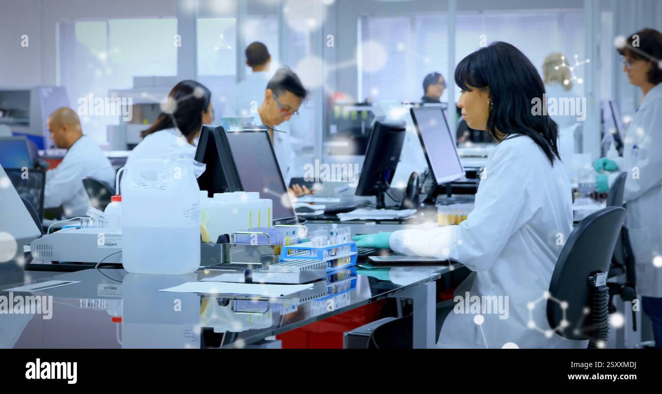 Image of molecules over diverse scientists working in lab Stock Photo ...