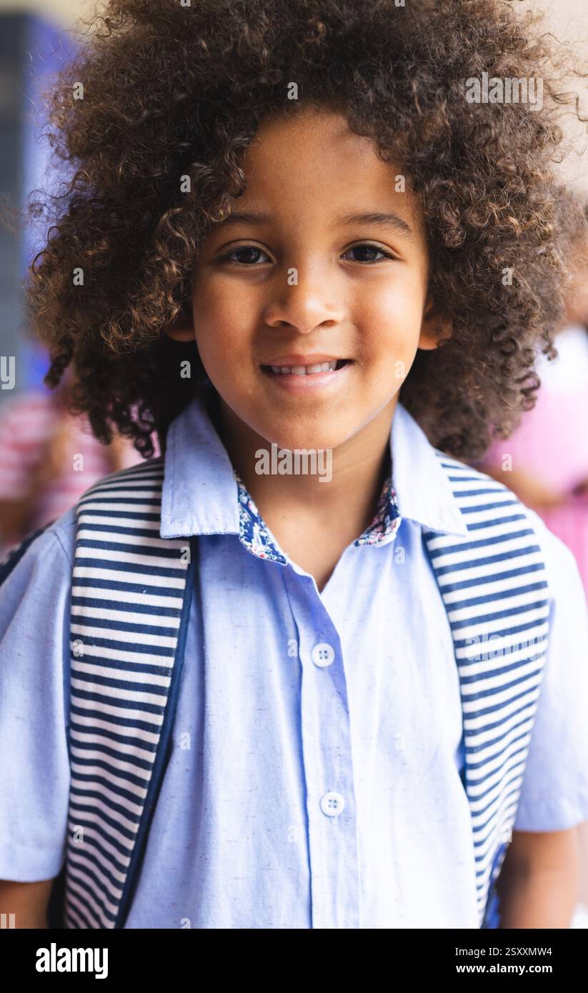 Smiling child with backpack ready for school, excited for new ...