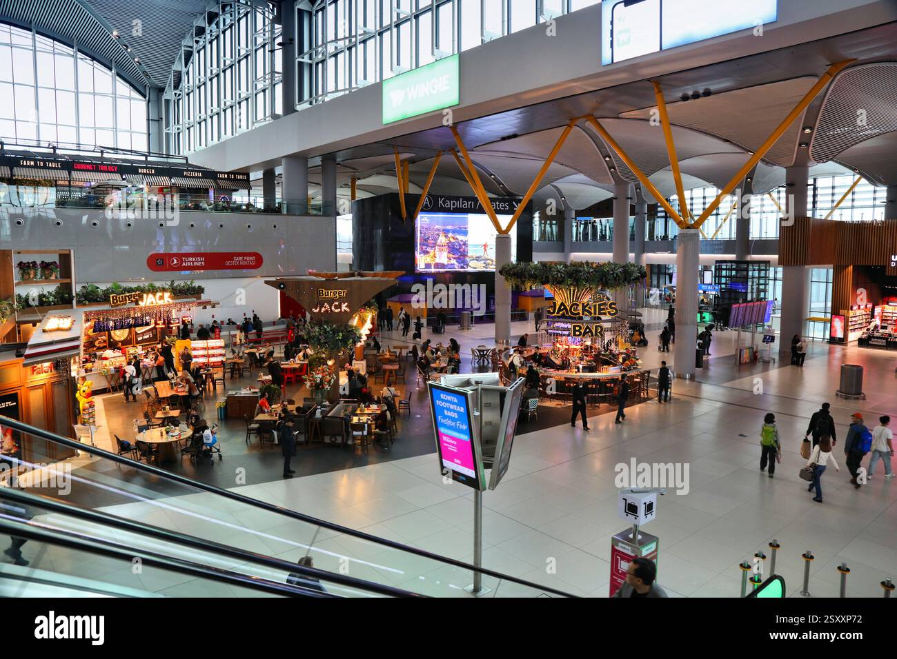 ISTANBUL, TURKEY - MARCH 1, 2024: Passengers visit gate area at ...