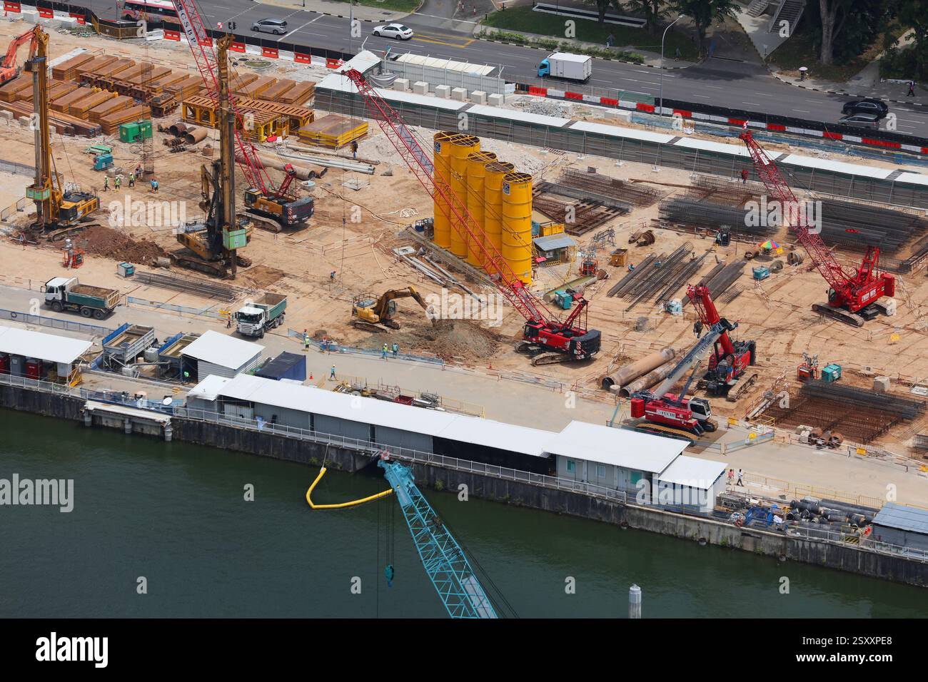SINGAPORE CITY, SINGAPORE - MARCH 12, 2024: Construction workers on ...