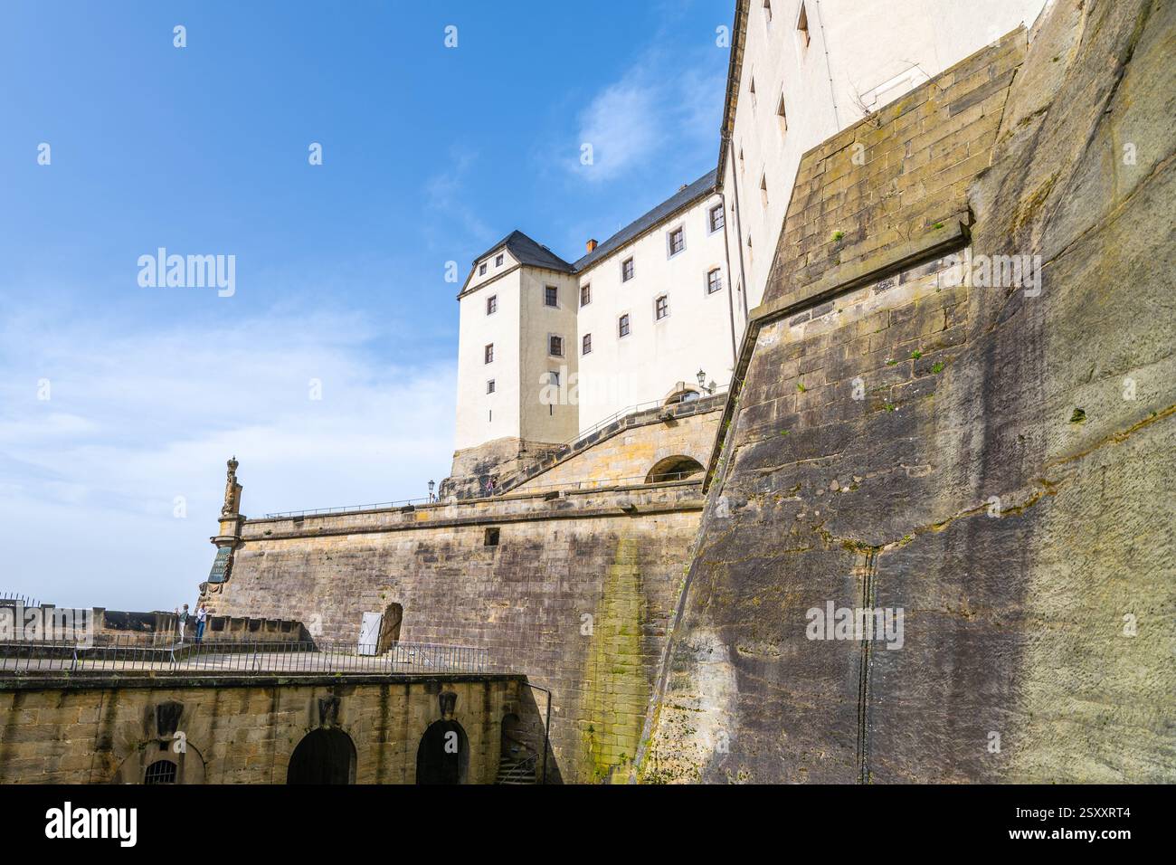 Visitors admire the grand architecture of Konigstein Fortress on a ...