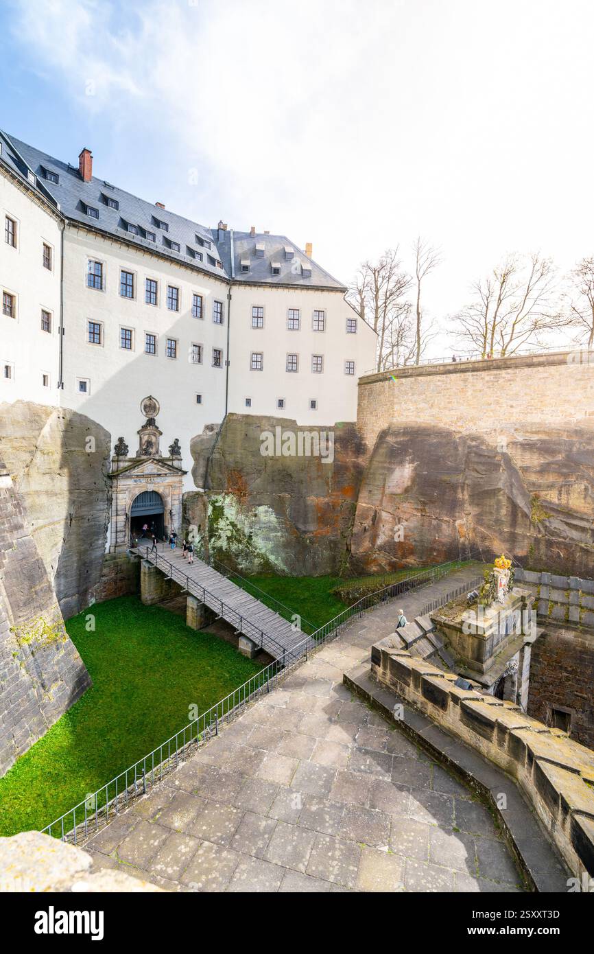Konigstein Fortress showcases its main entrance with sturdy stone walls ...
