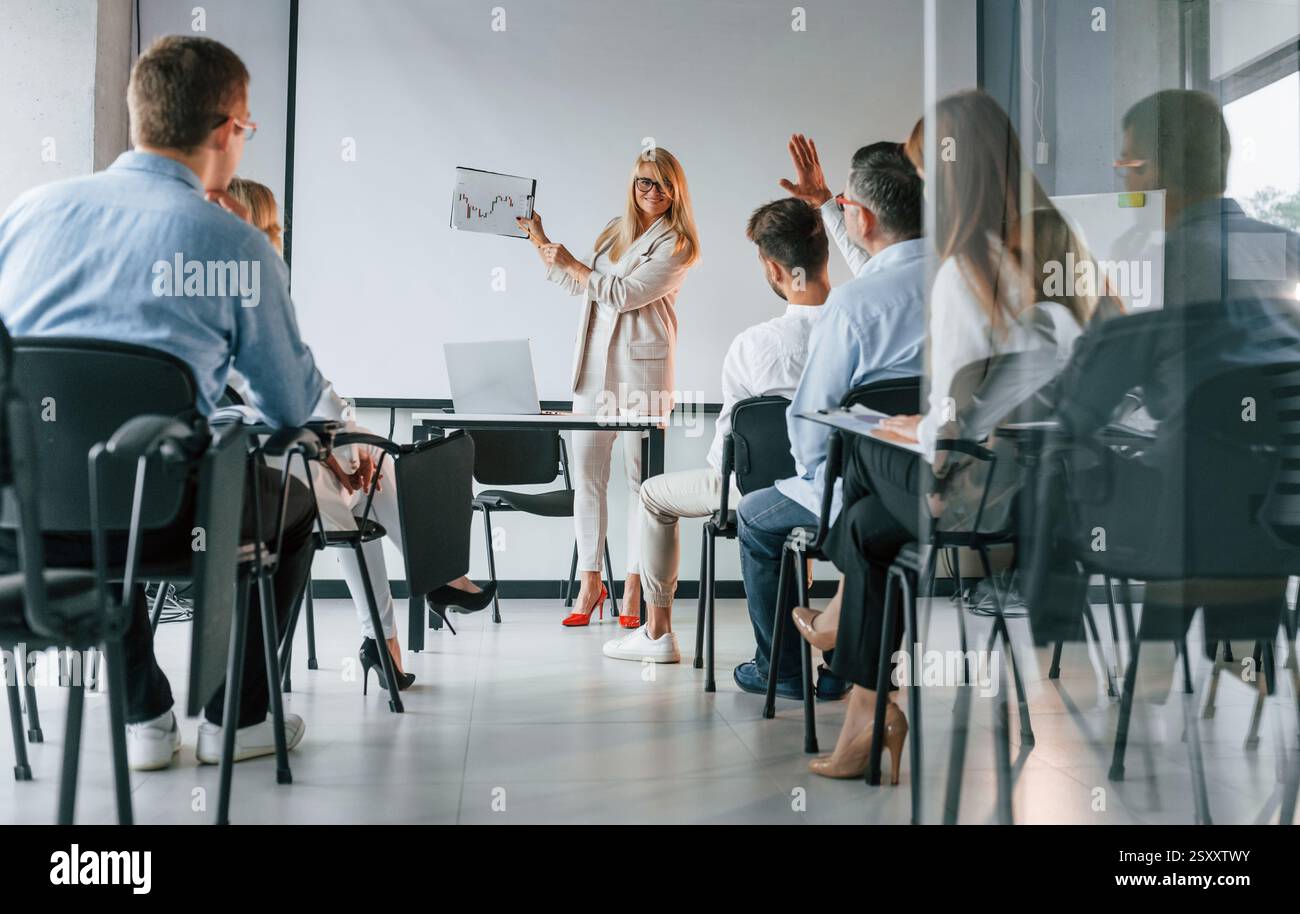 Explaining new stuff for students. Group of professional business ...