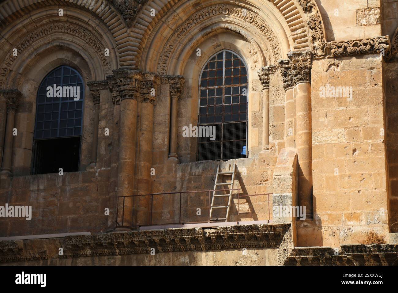 Church of the Holy Sepulchre and famous Status Quo ladder. Landmark of ...