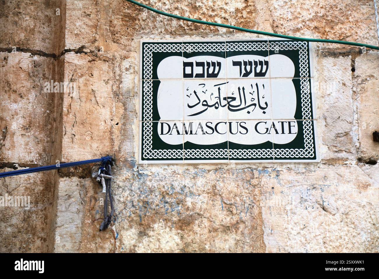 Damascus Gate sign in Jerusalem city. Sign in three languages. One of ...