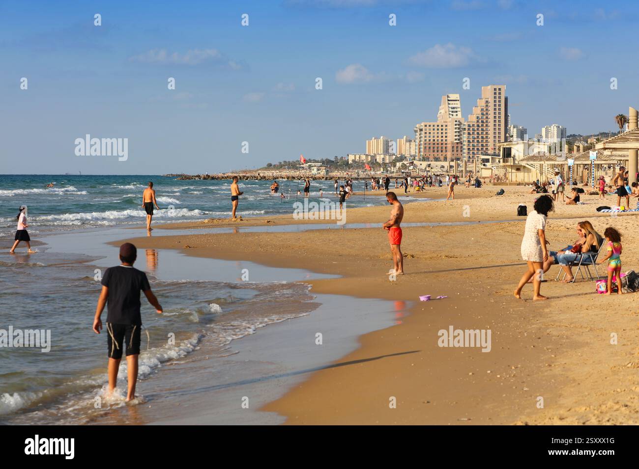 HAIFA, ISRAEL - NOVEMBER 1, 2022: People visit sandy Dado Beach in ...