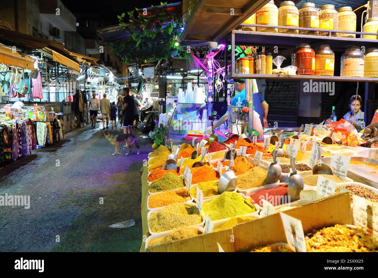 TEL AVIV, ISRAEL - NOVEMBER 2, 2022: Colorful spices at Carmel Market ...