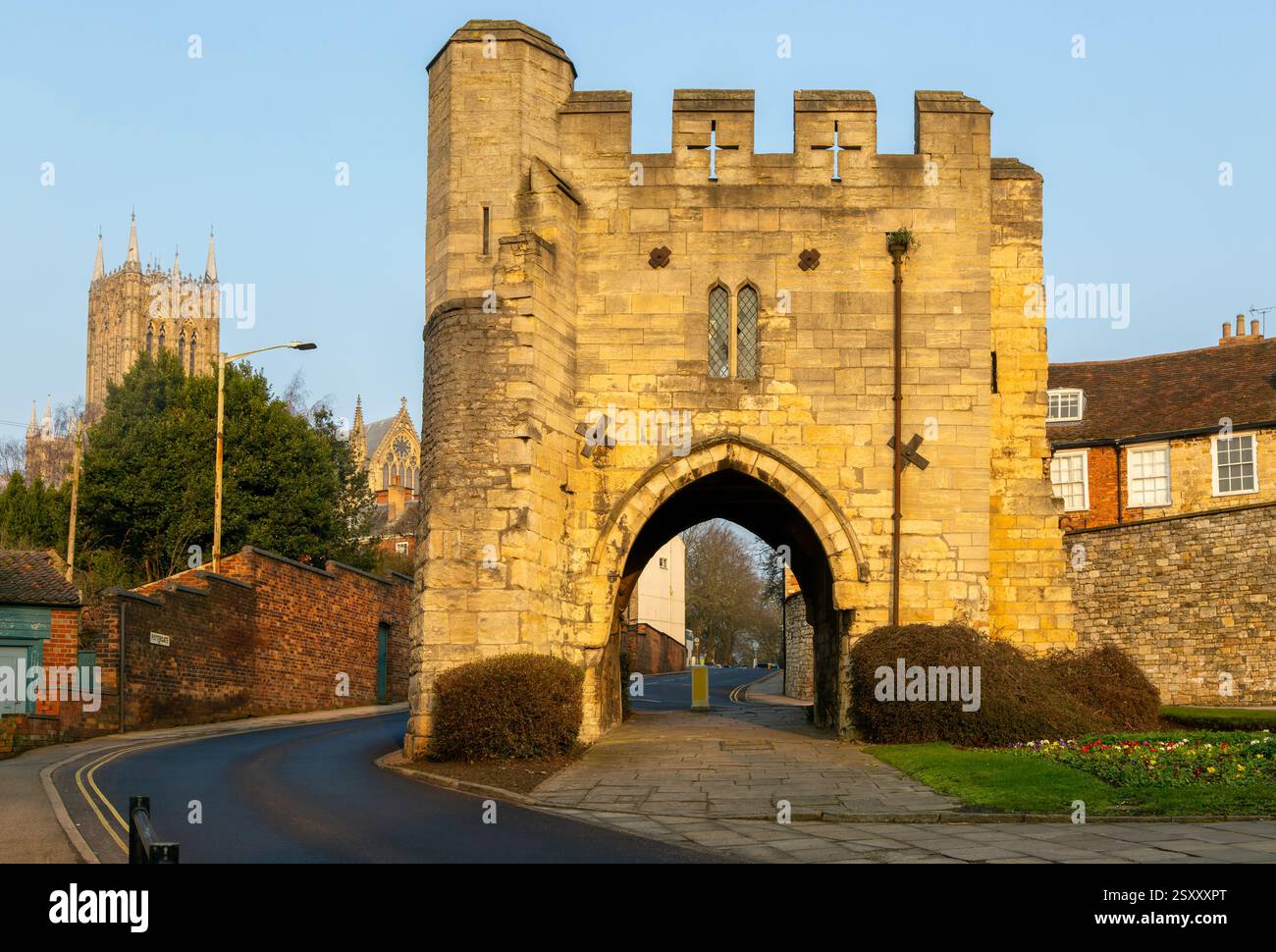 Pottergate medieval stone archway entrance to cathedral area in city of ...