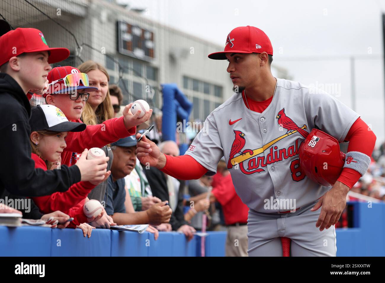 Dunedin, FL: St. Louis Cardinals outfielder Bryan Torres (89) signs ...