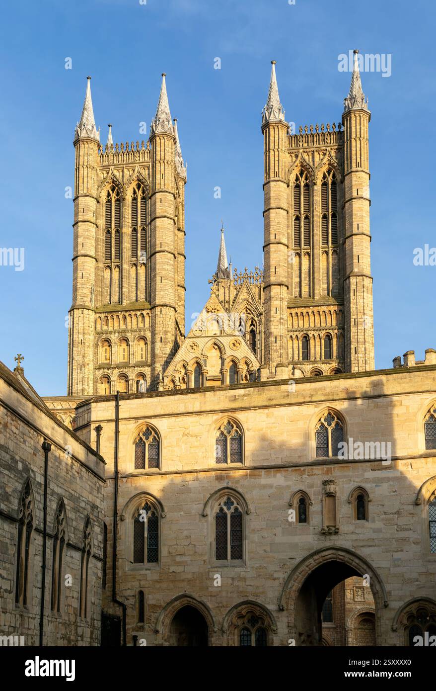 Towers of cathedral church rise above the medieval Exchequer Gate ...