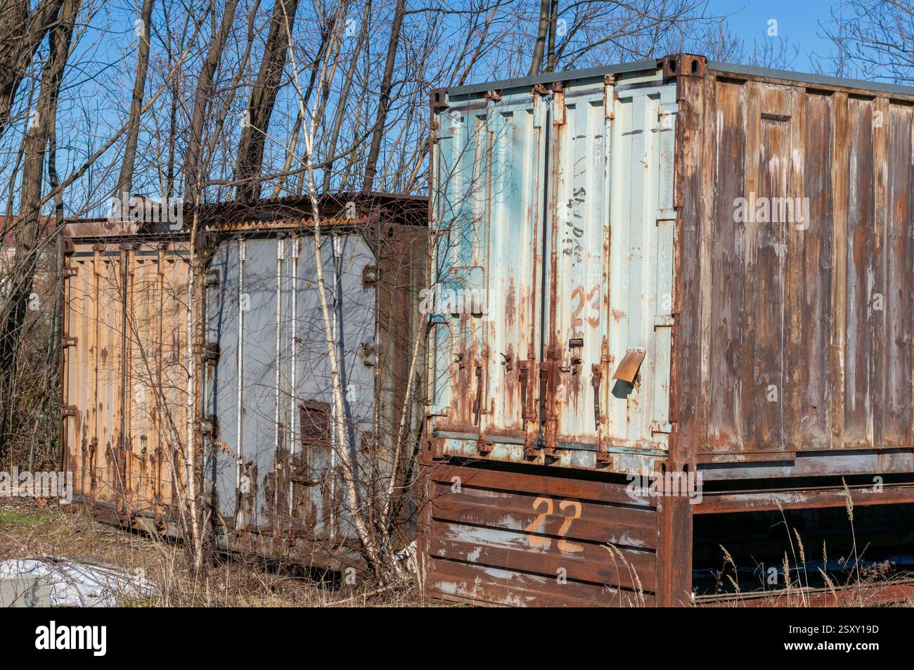 old abandoned rusted shipping containers Stock Photo - Alamy