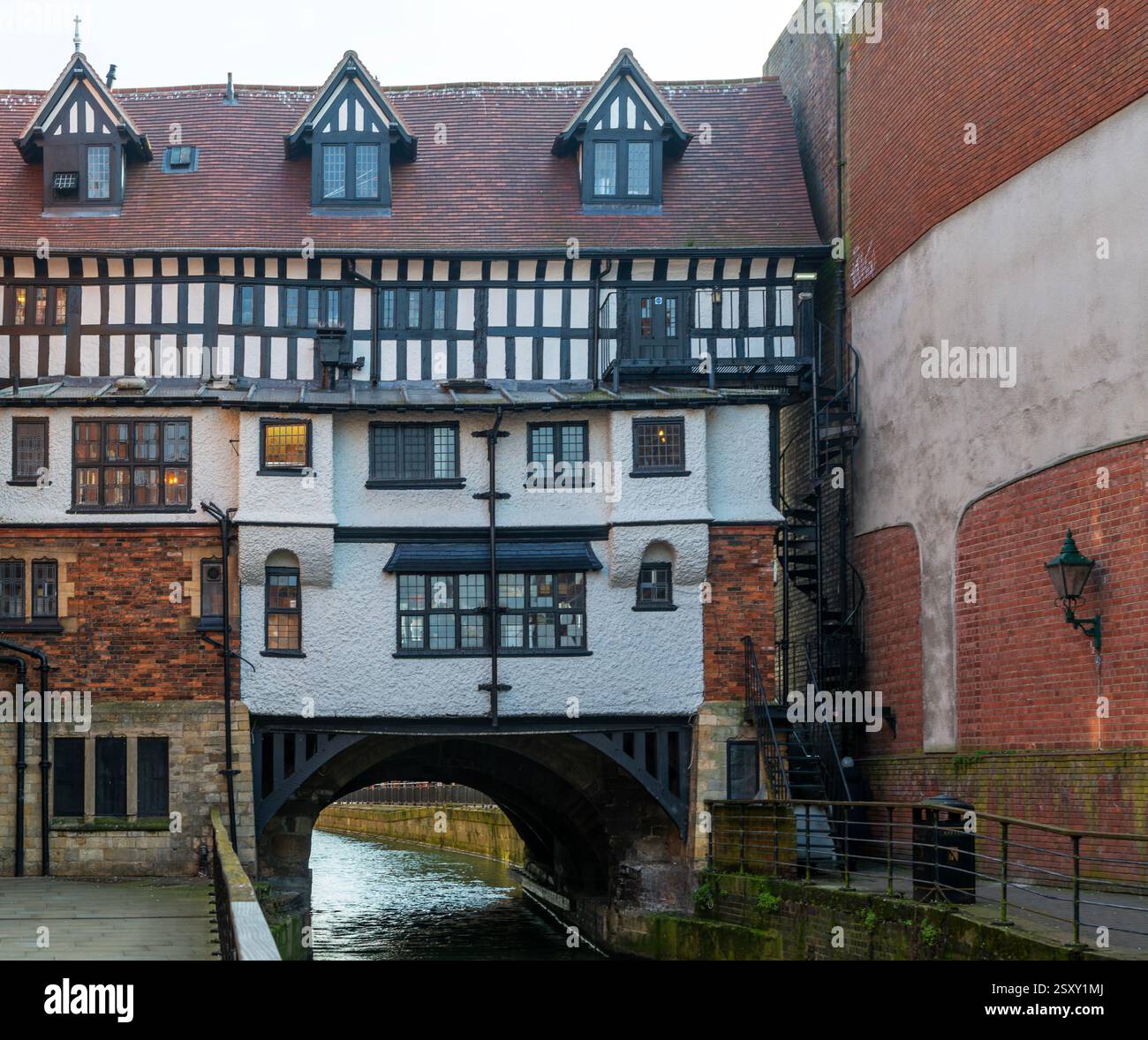 Timber framed buildings on historic High Bridge over River Witham ...