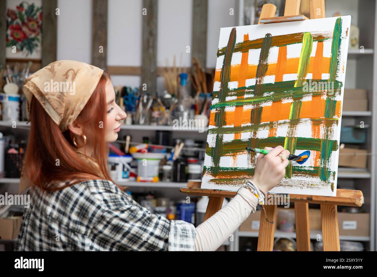 A Creative Artist Immersed in the Process of Painting a Vibrant ...
