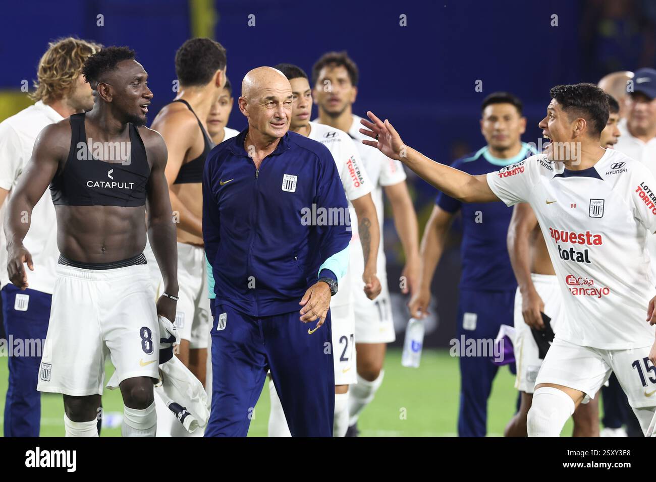 Peru’s Alianza Lima Argentine assistant Jorge Borelli (C) celebrates ...