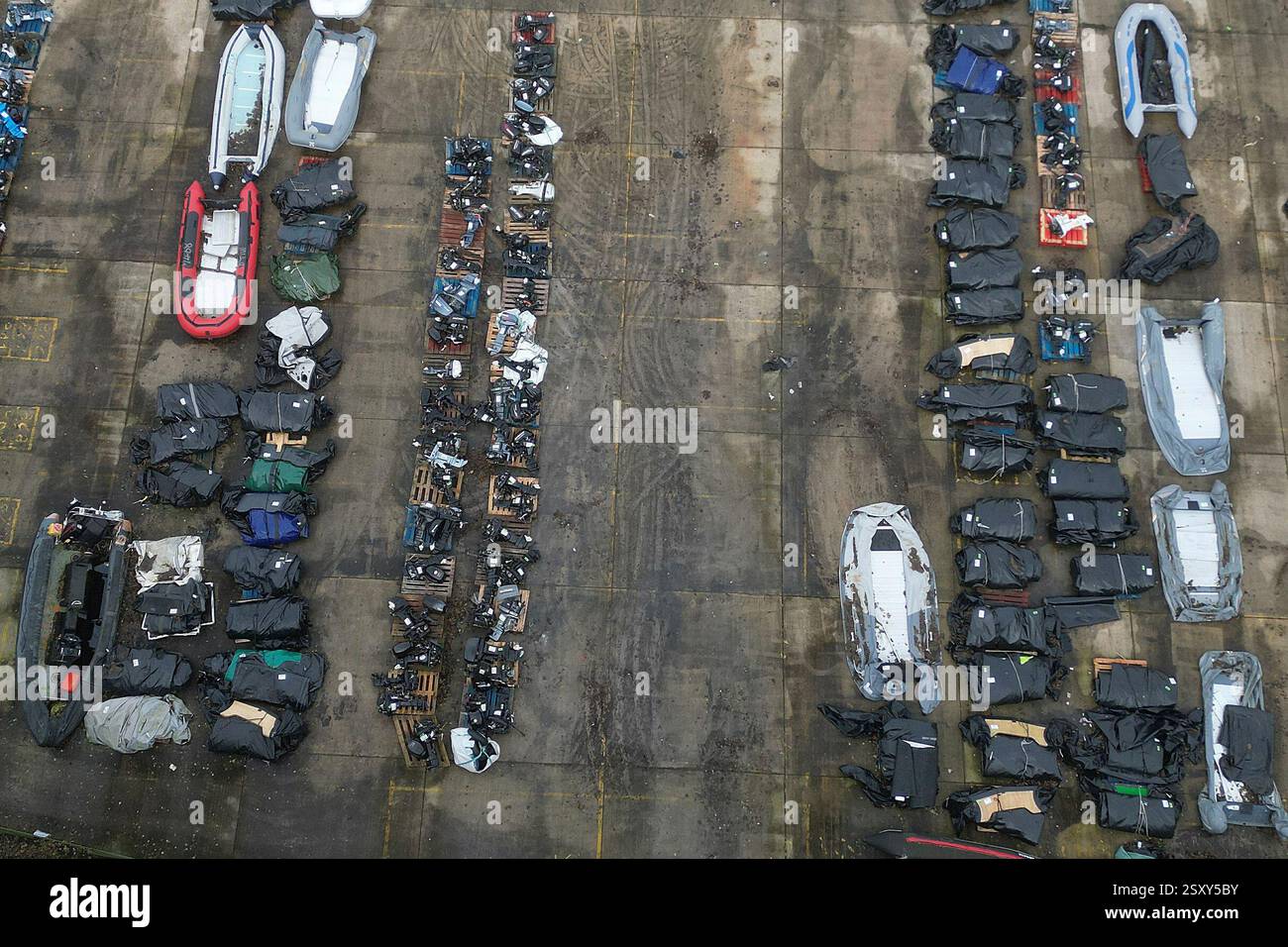 A general view of small boats and inflatable dinghies in a Border Force ...