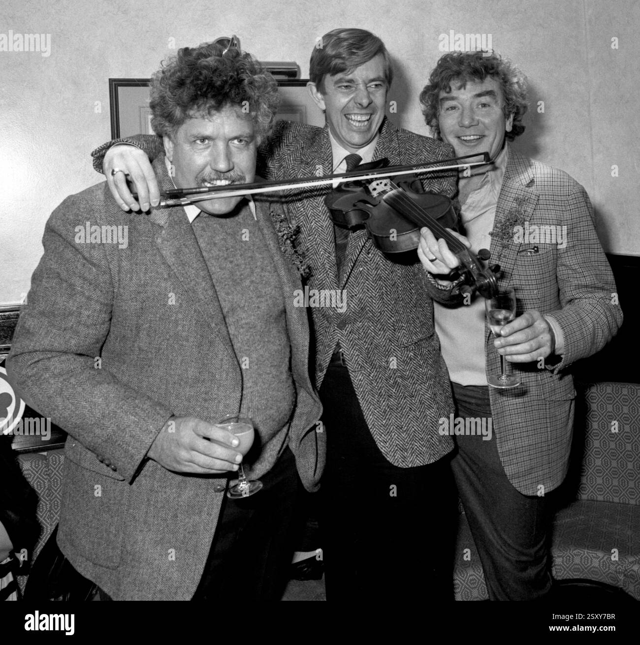 File photo dated 17/03/85 of TV personality Henry Kelly (centre ...