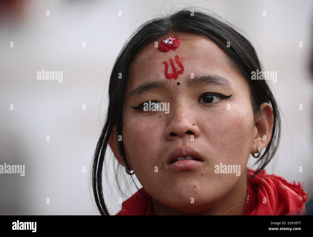 February 26, 2025: A girl returns after offering prayers at the Shiva ...