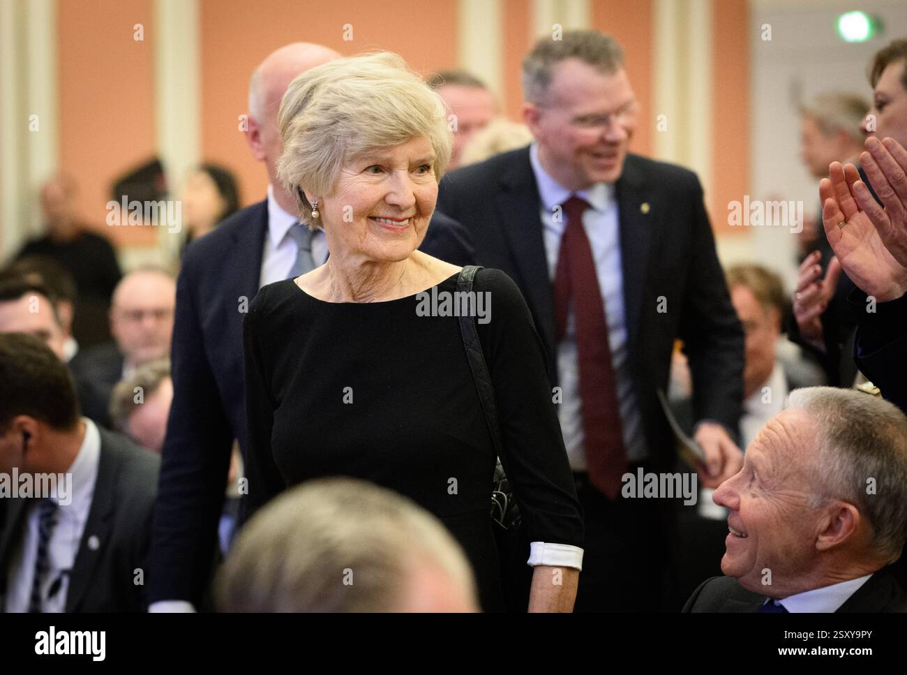 26 February 2025, Berlin: Friede Springer joins Kai Wegner (CDU ...