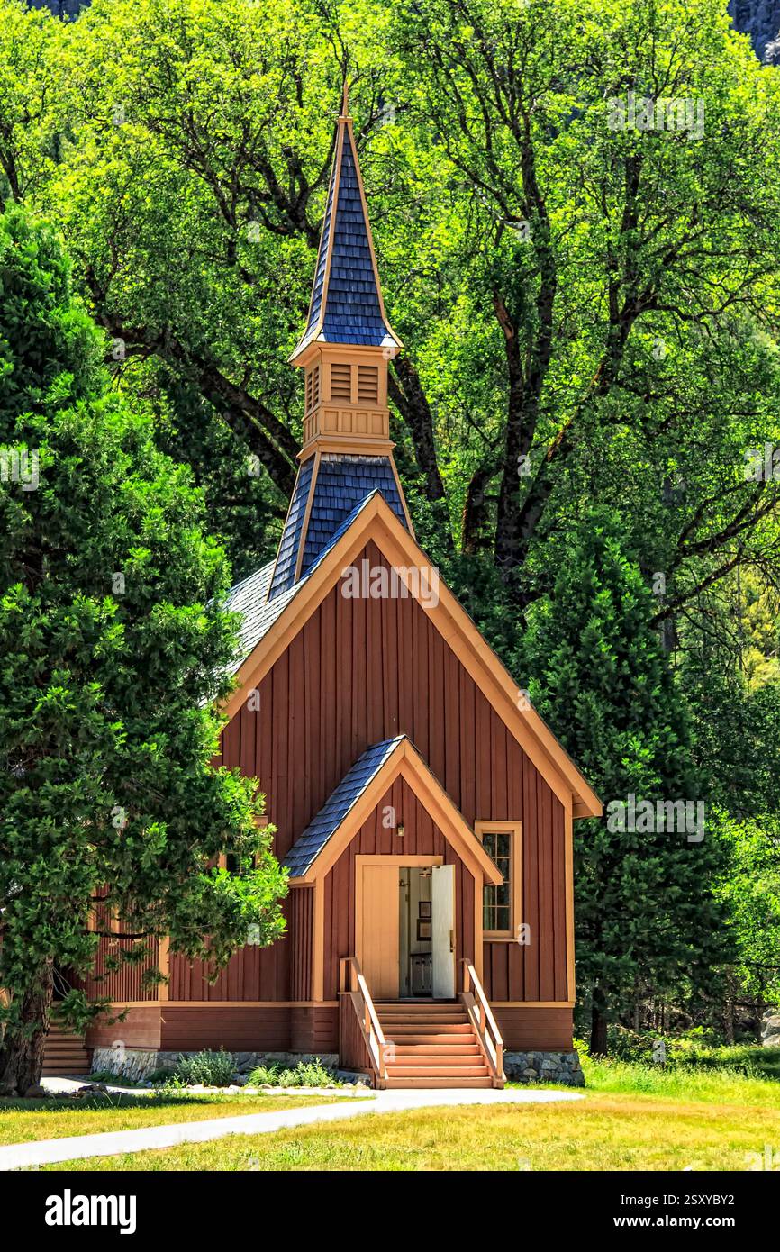 Small church with a steeple and a porch. The porch has a ladder leading ...