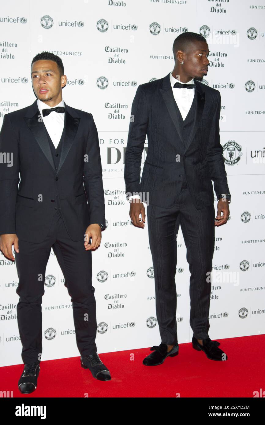 Memphis Depay and Paul Pogba at the United for Unicef Gala Dinner Old Trafford Manchester, UK ...