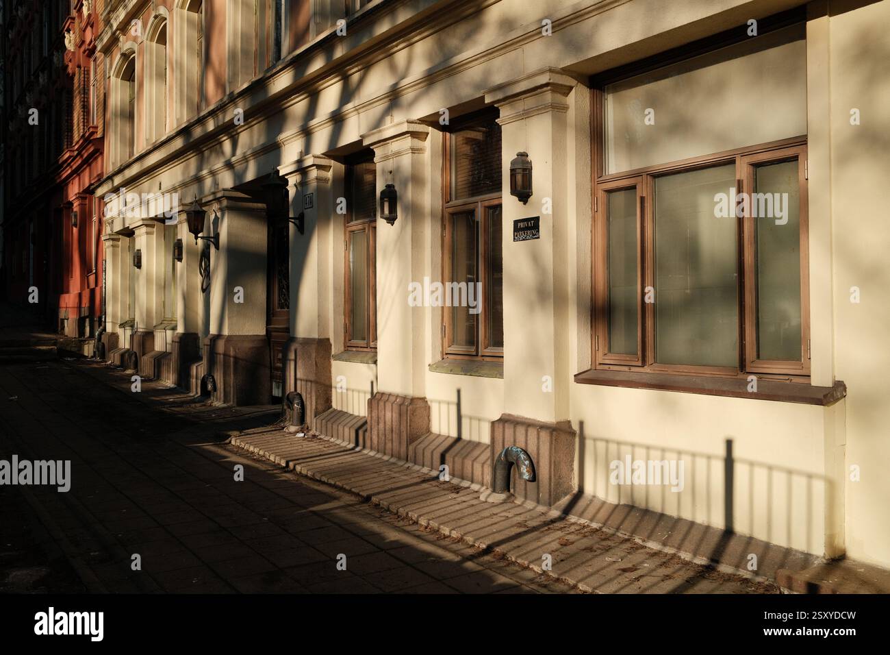 Illuminated by soft evening light, the elegant facades of historic ...
