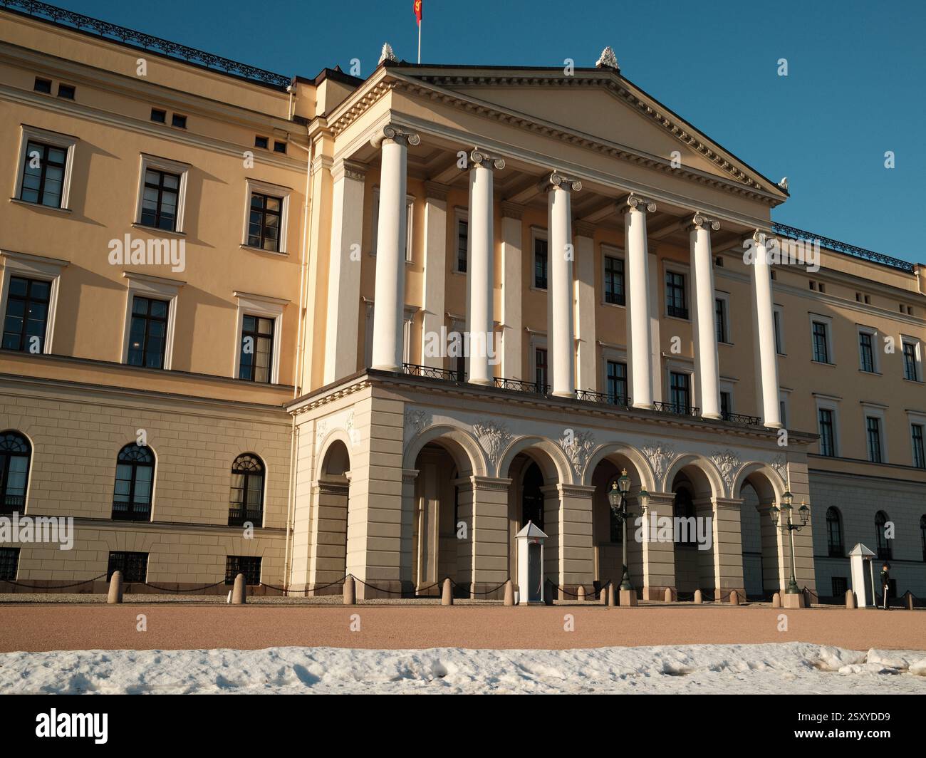 A majestic building featuring classical architecture with prominent ...