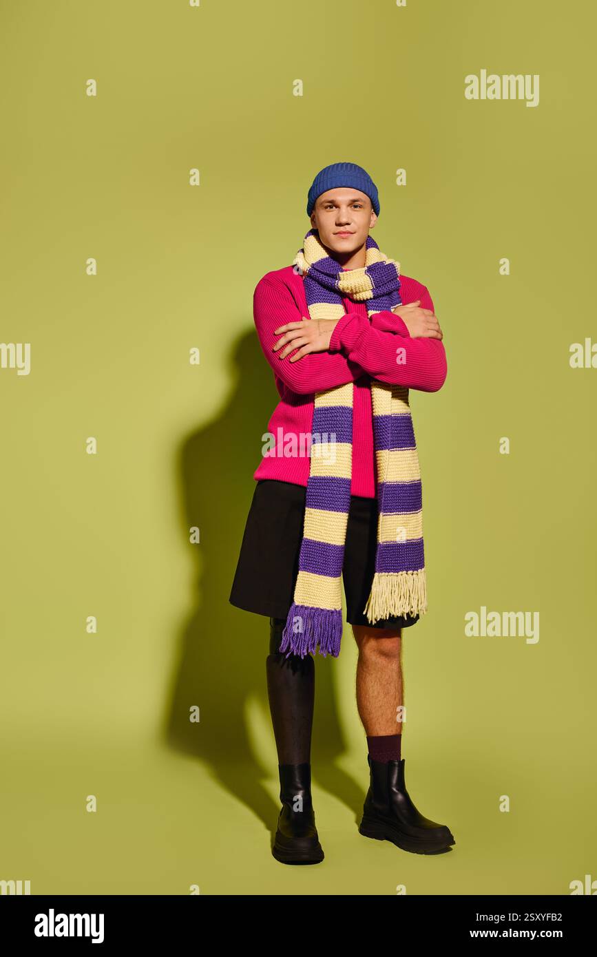 A stylish young man confidently showcases his prosthetic leg in a ...
